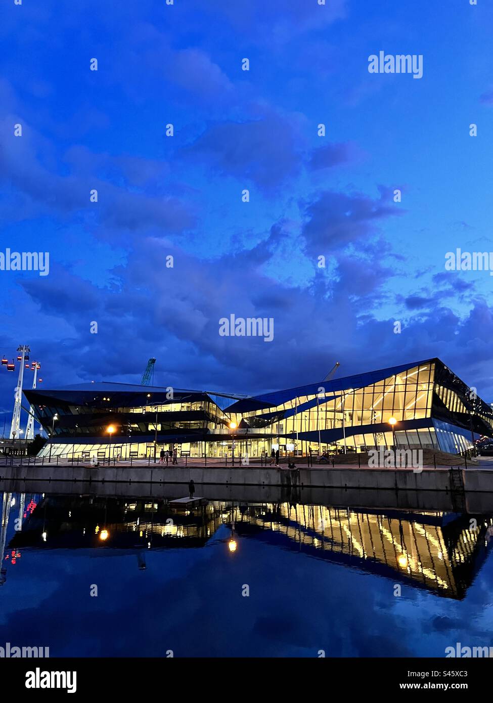 Enjoying the tranquil vibes of this stunning waterfront building ...