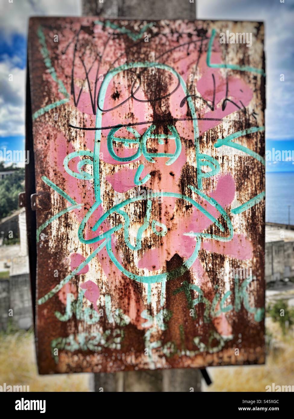 Grafitti of a face in a abandoned factory in Lemoiz, Spain Stock Photo ...