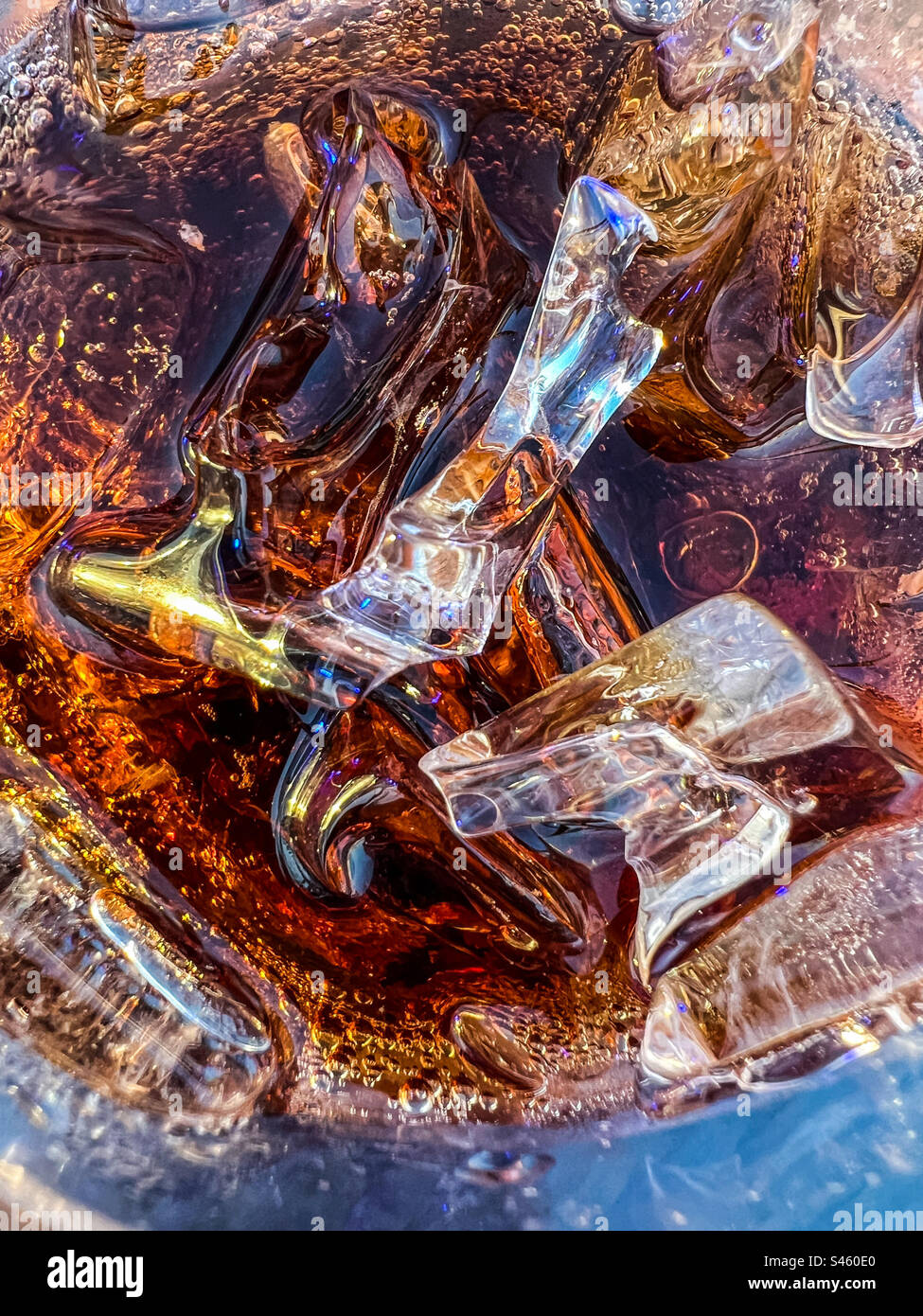 Ice cold cola cubes in smartphone stock photos and images - Alamy