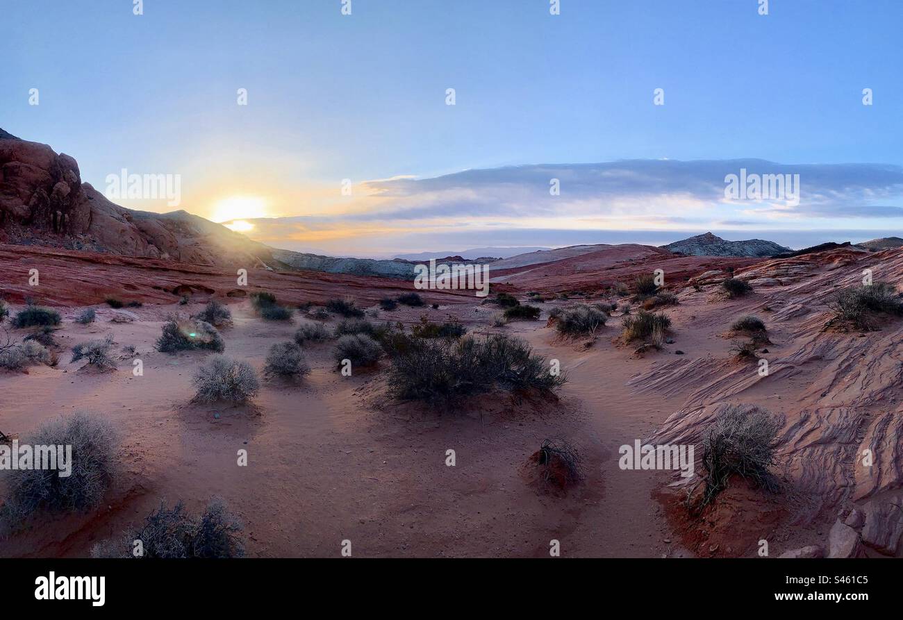 The sun rising over Valley of Fire State Park. The desert at sunrise ...