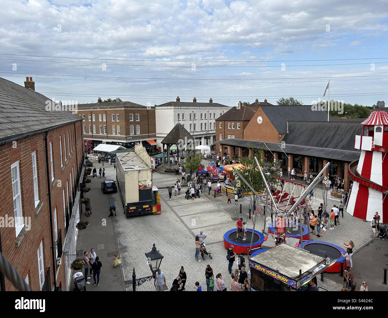 Fairground rides in the town square hi-res stock photography and images ...