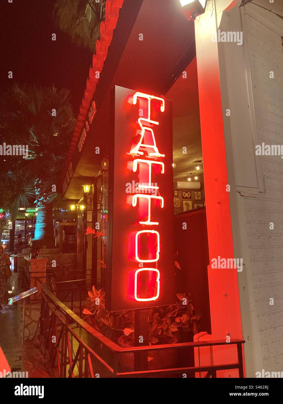 Tattoo neon sign Stock Photo - Alamy