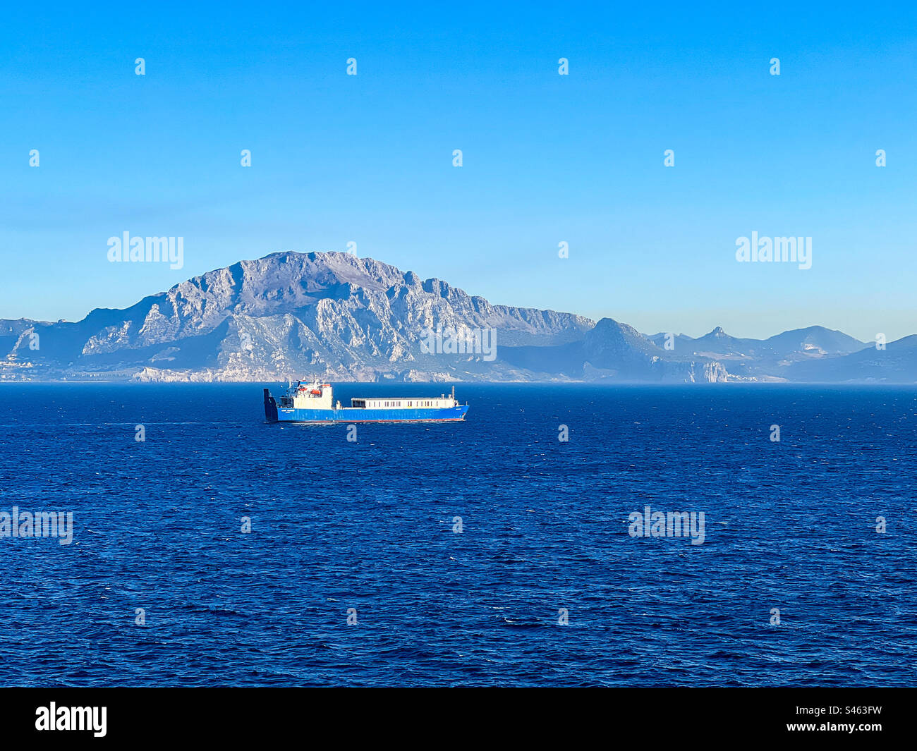 Container ship on the Strait of Gibraltar in summer Stock Photo - Alamy