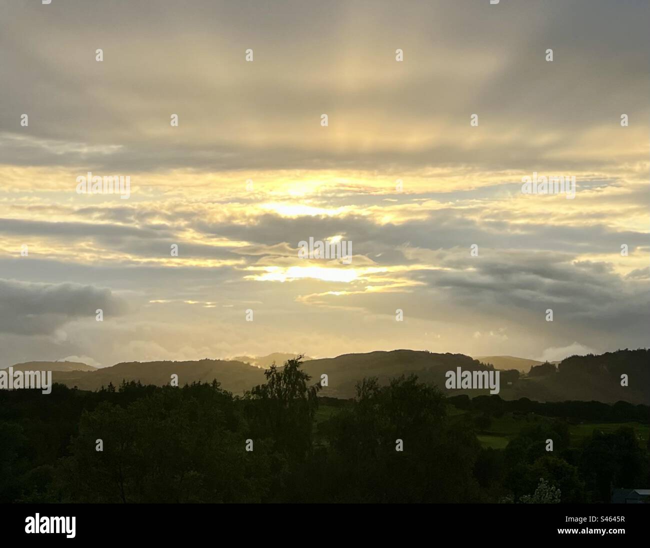 Sunbeam through clouds hi-res stock photography and images - Alamy