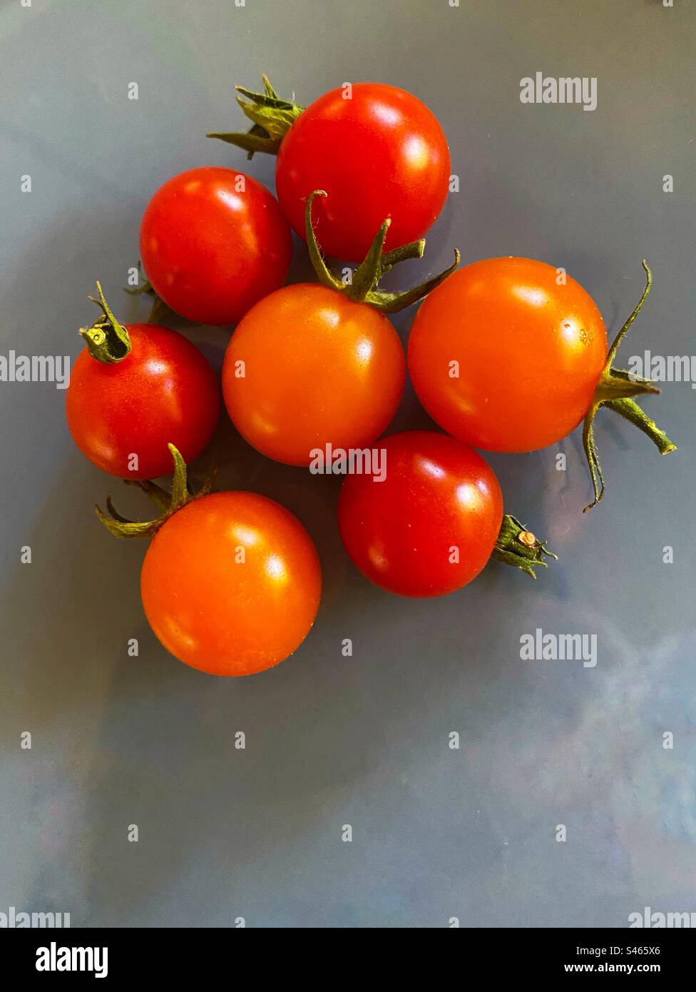 Seven fresh cherry tomatoes Stock Photo - Alamy