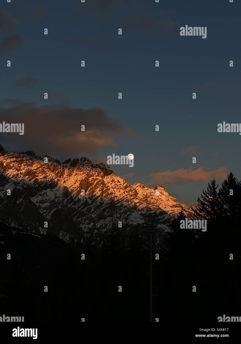 Moon at sunset hi-res stock photography and images - Alamy