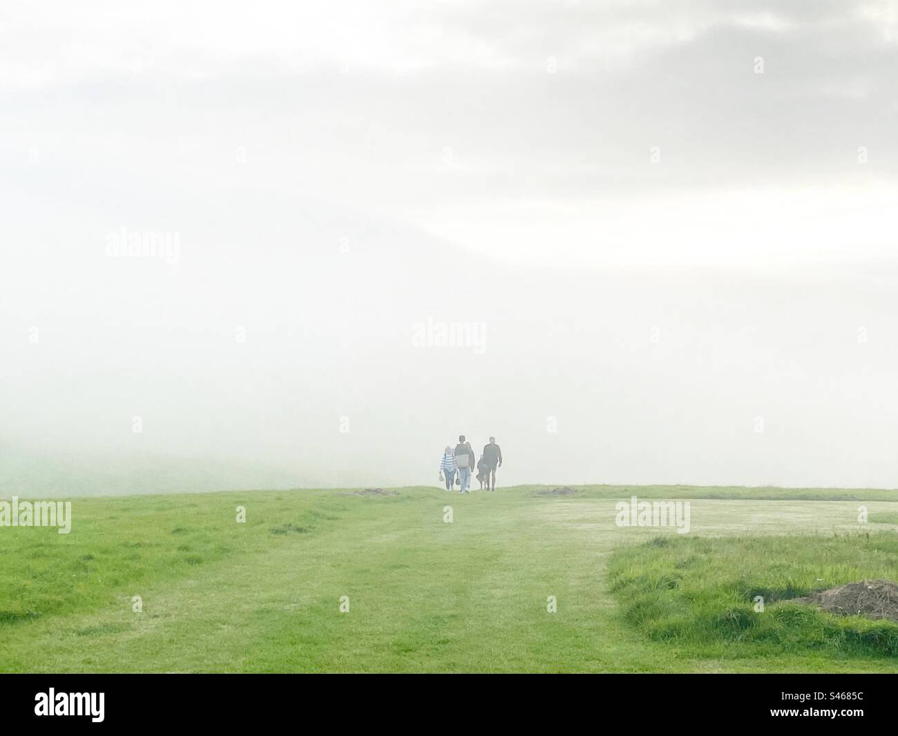 Family walk through mist hi-res stock photography and images - Alamy