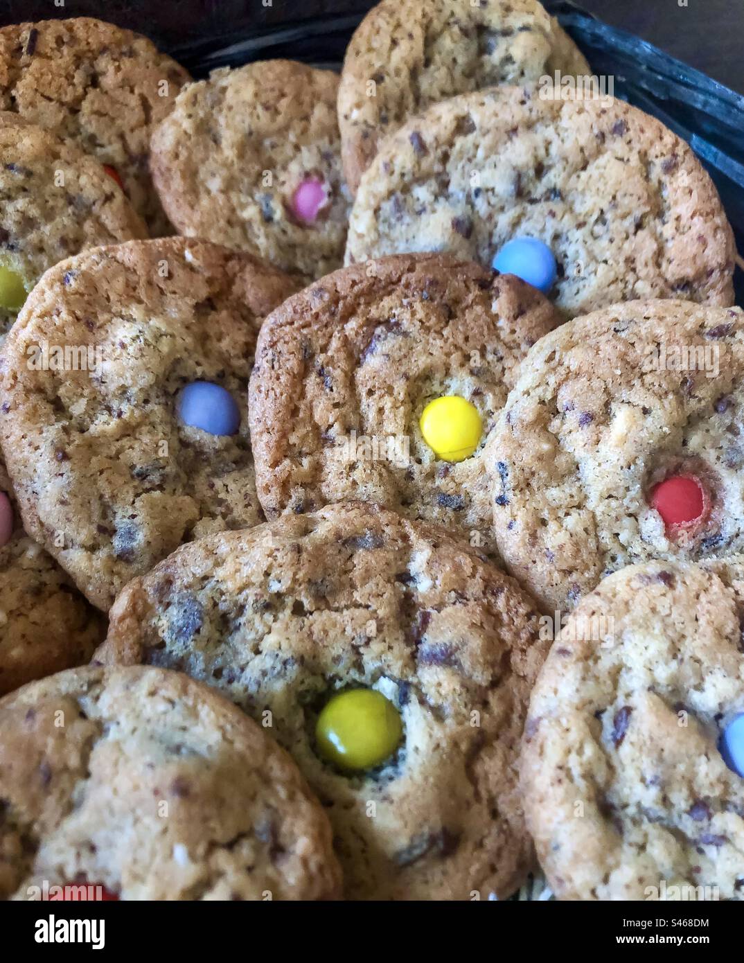 A batch of chocolate chip cookies Stock Photo - Alamy