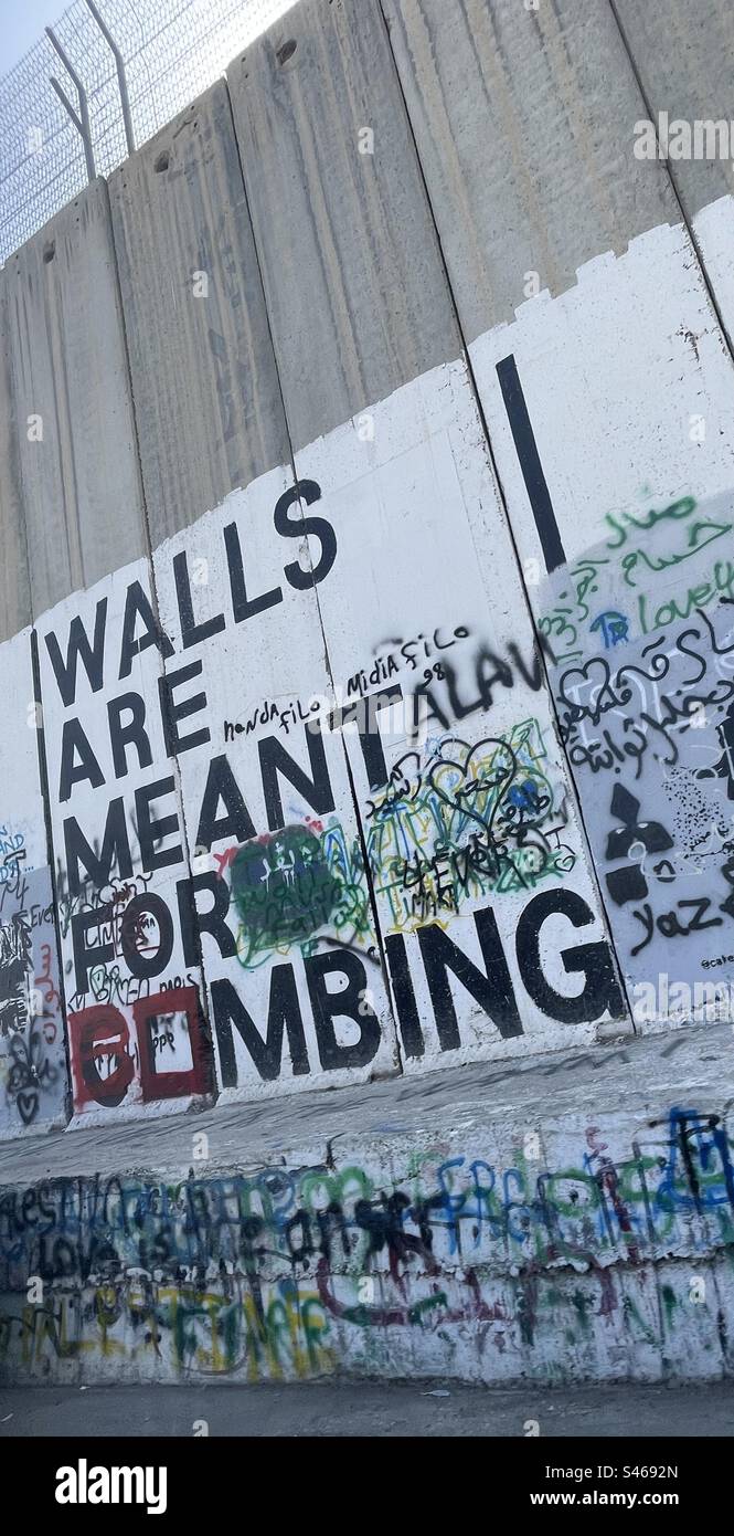 Murals decorating the Israeli security barrier in Bethlehem, Palestine ...