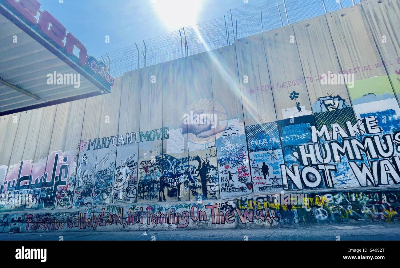 Murals decorating the Israeli security barrier in Bethlehem, Palestine ...