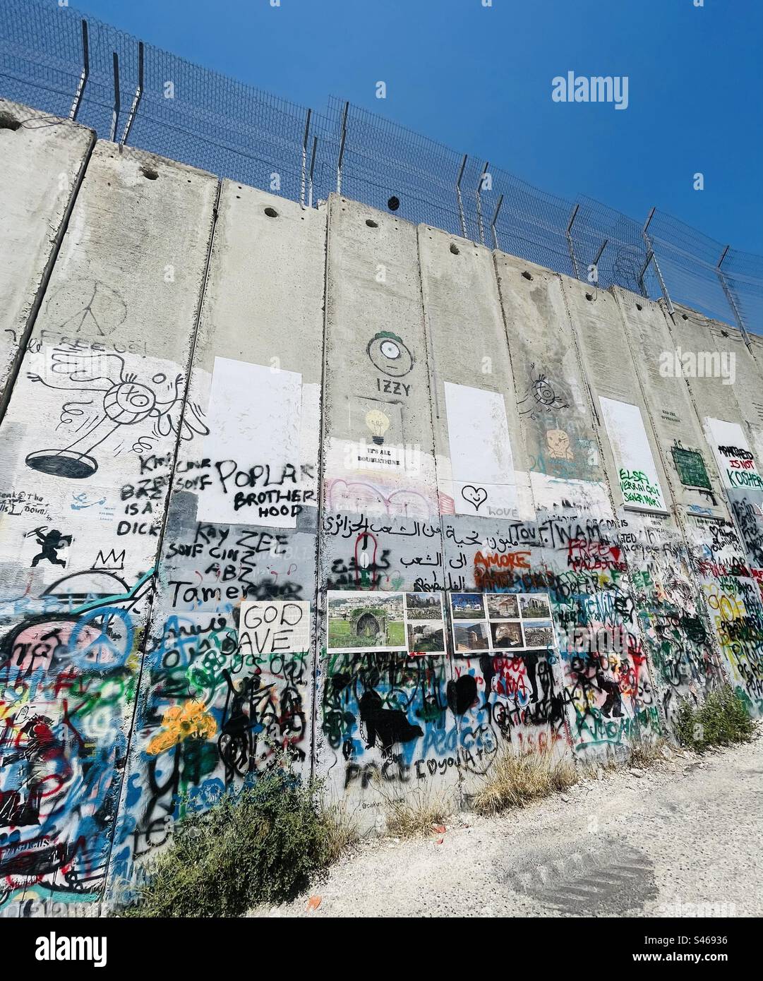 Murals decorating the Israeli security barrier in Bethlehem, Palestine ...