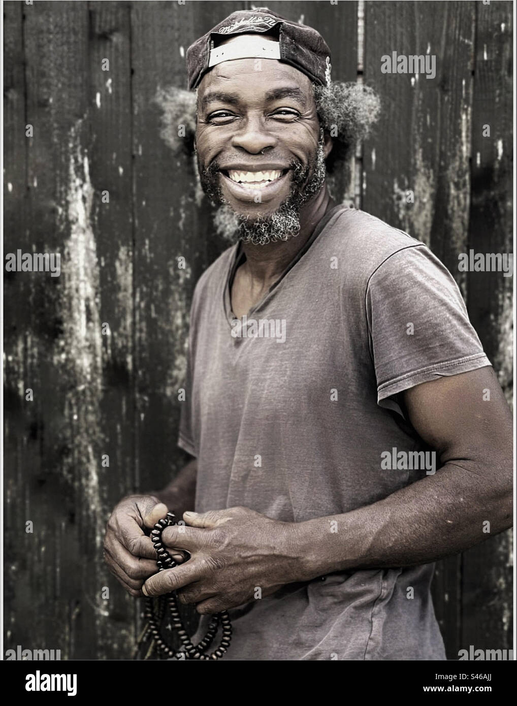 A laughing Black male Stock Photo - Alamy