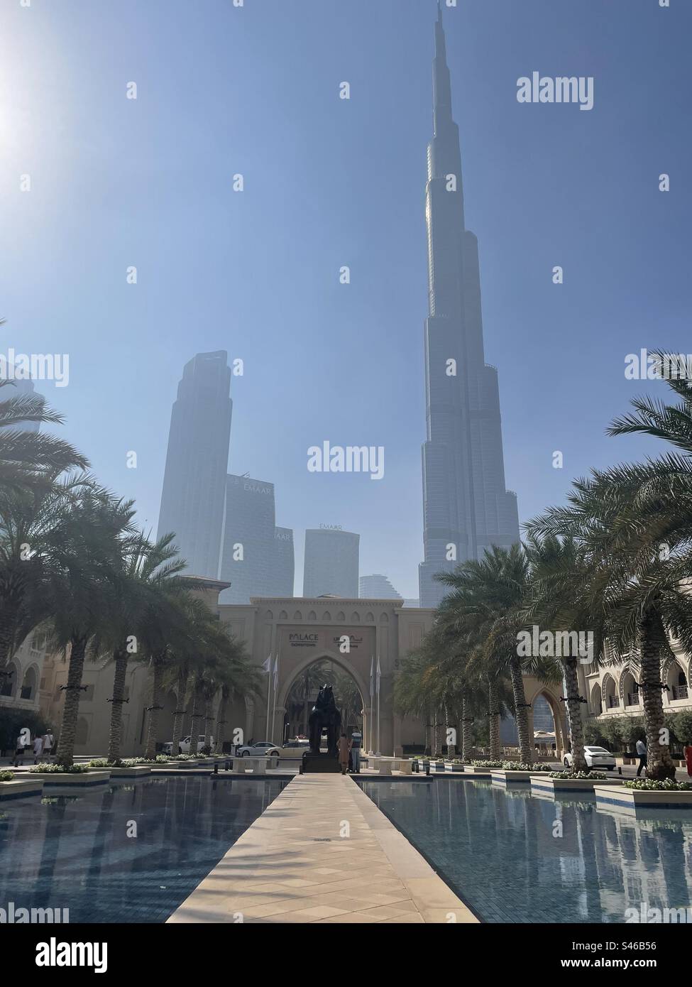 United Arab Emirates, Dubai, Palm tree path leading up to hotel in ...