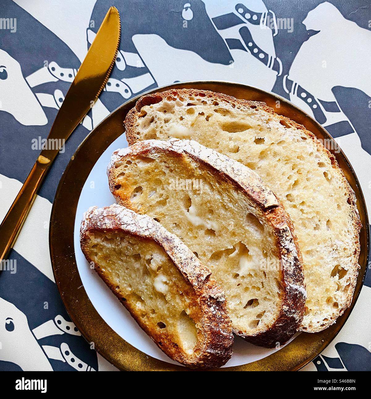 Sourdough toast and butter Stock Photo - Alamy