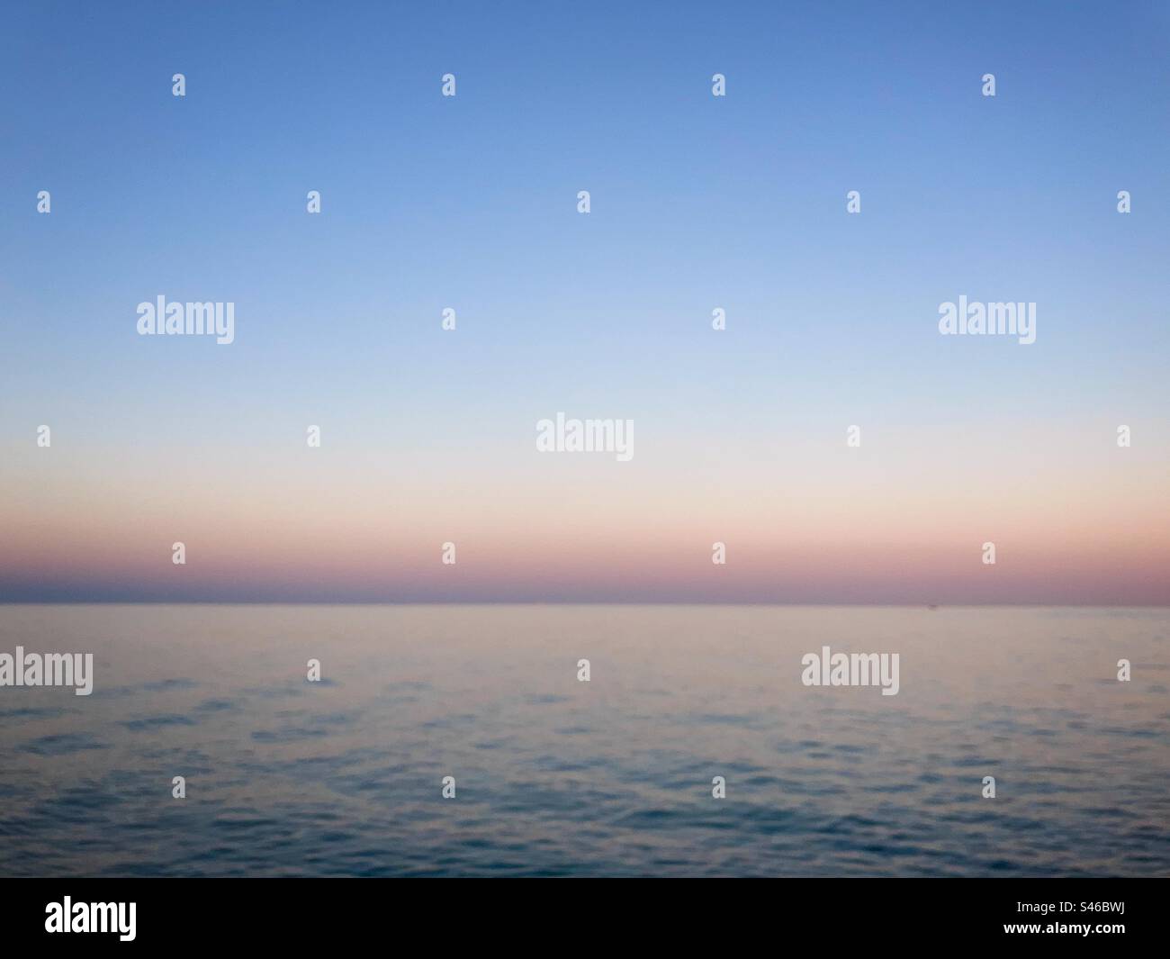 Sunset colours over the sea Stock Photo - Alamy