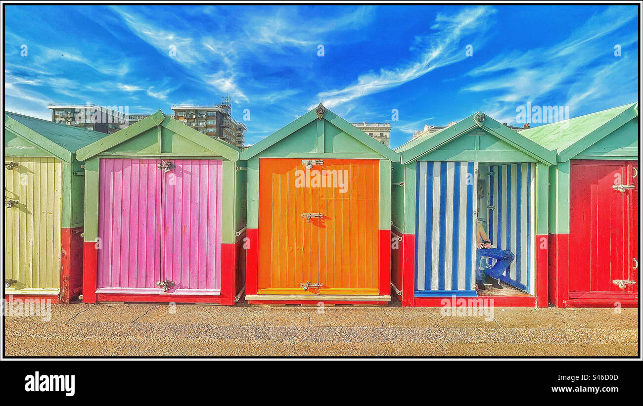 Colourful beach huts in Hove Stock Photo - Alamy