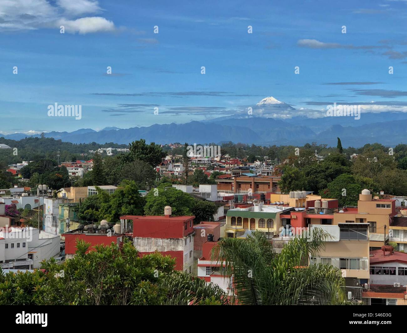 View of Orizaba Peak in Mexico, with the skyline of Xalapa, Veracruz in ...
