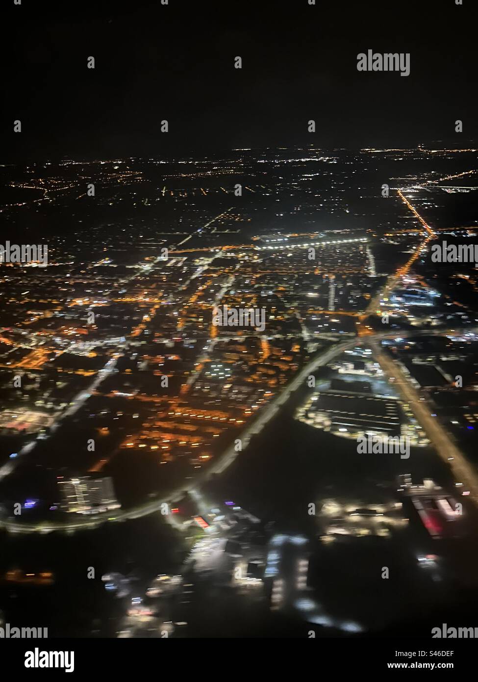 City lights from plane window Stock Photo - Alamy