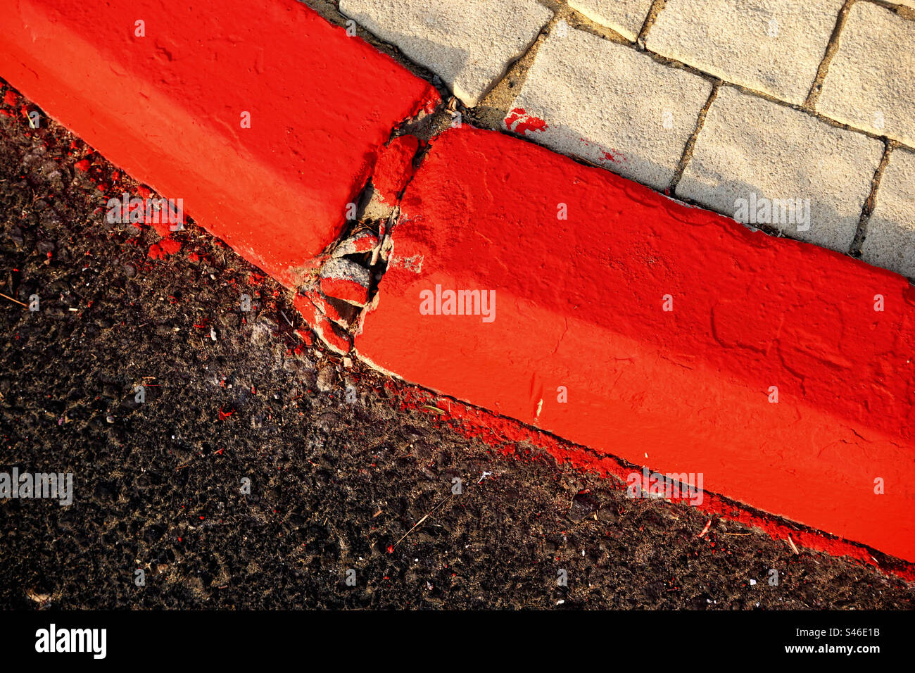 Strong red colour at street mark Stock Photo - Alamy