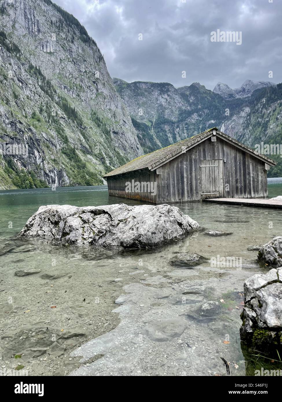 Pure water and Boat shelter by the Obersee next to Königsee, one of ...