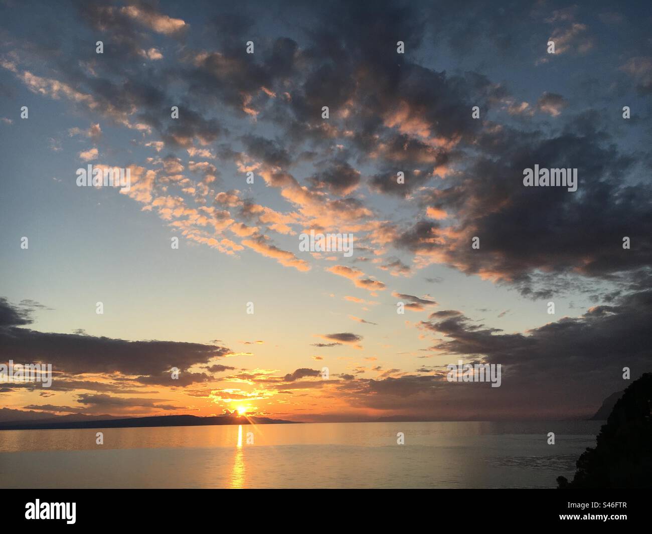 Sunset under the clouds hi-res stock photography and images - Alamy
