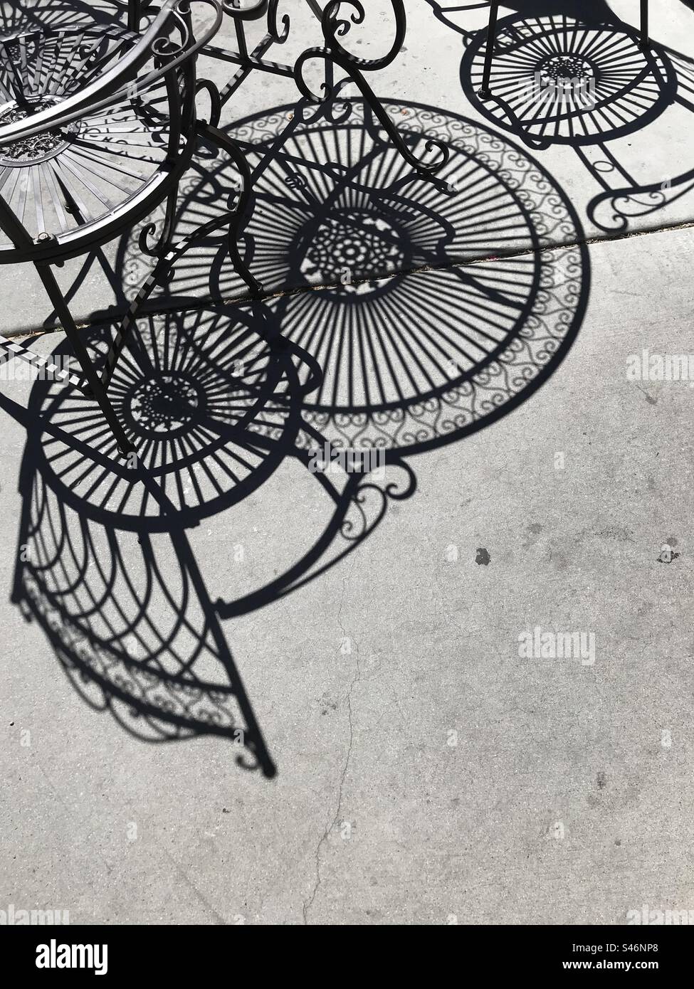Chair shadows on sidewalk hi-res stock photography and images - Alamy