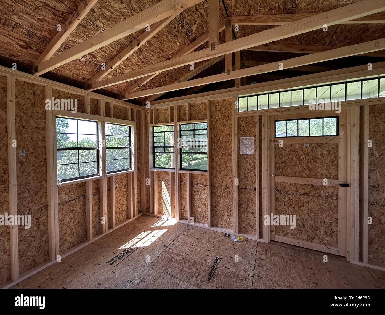 Unfinished interior of shed Stock Photo - Alamy