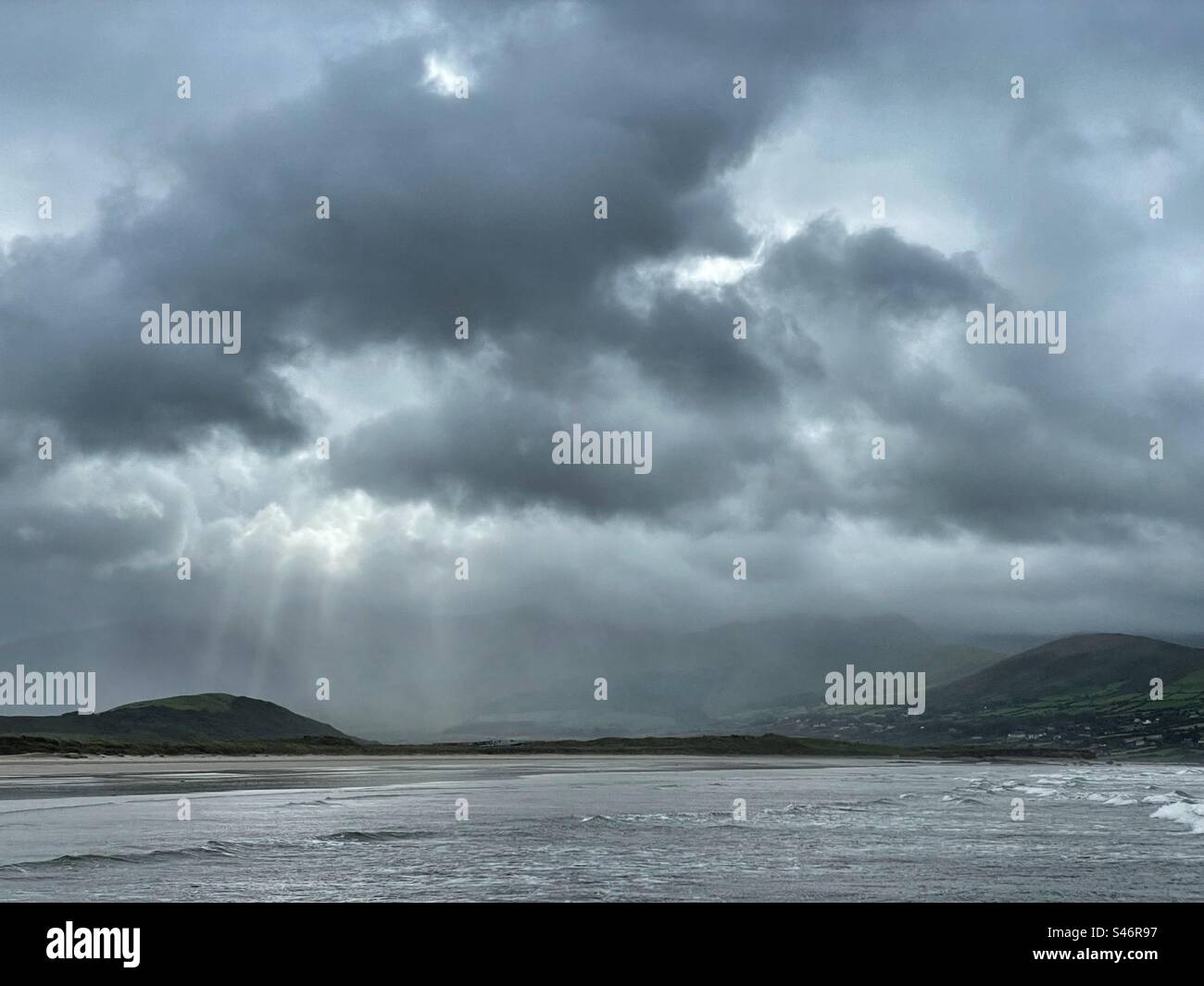 Dramatic sky after a rain shower on Fermoyle Strand, looking towards ...