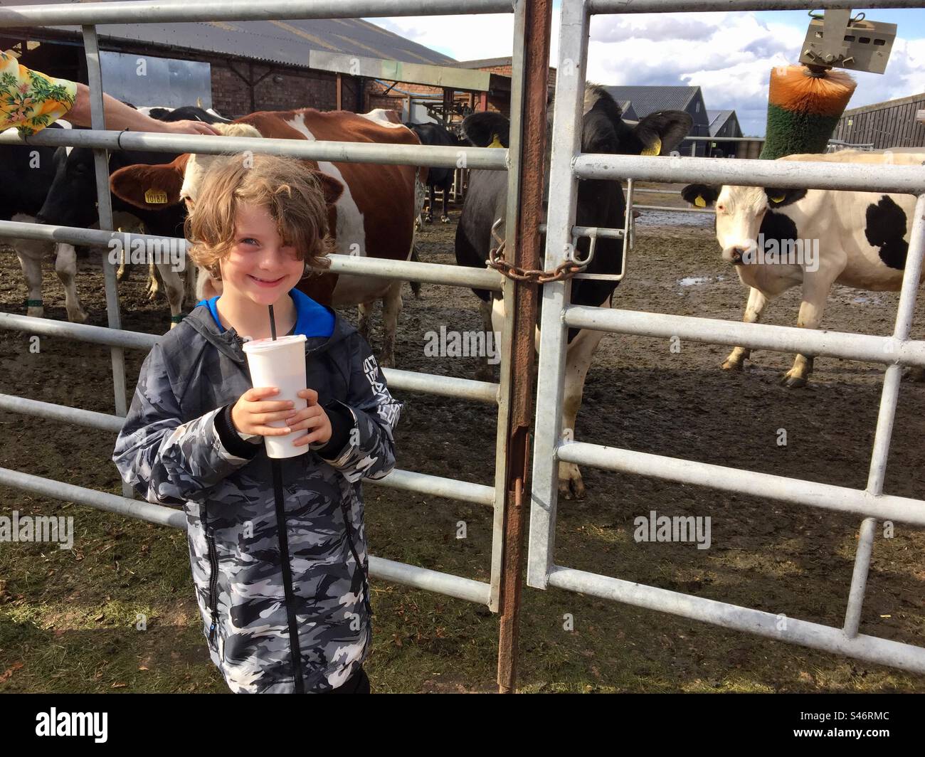 Milkshake at the dairy farm child with drink Stock Photo - Alamy