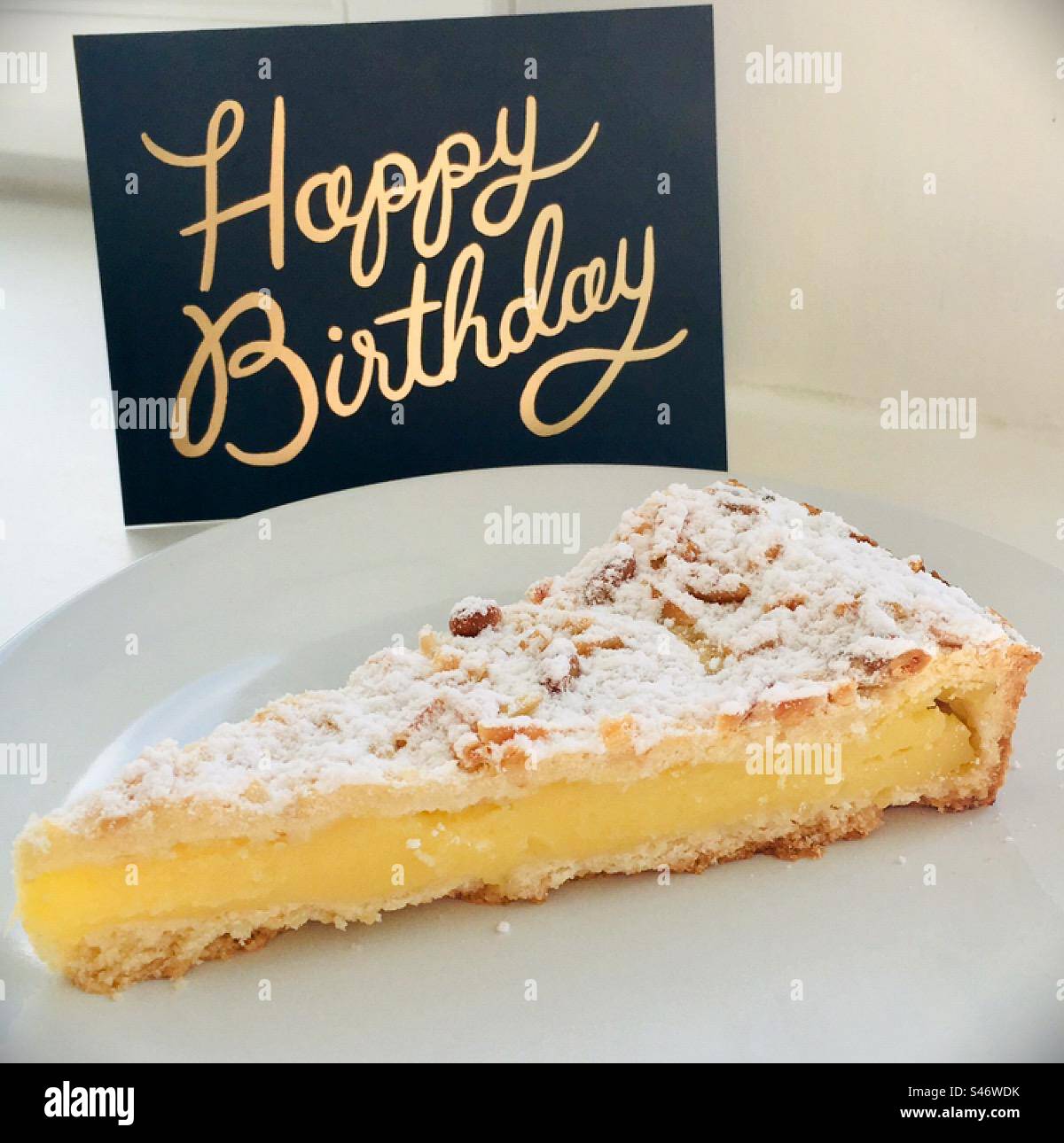 A slice of birthday cake Stock Photo - Alamy