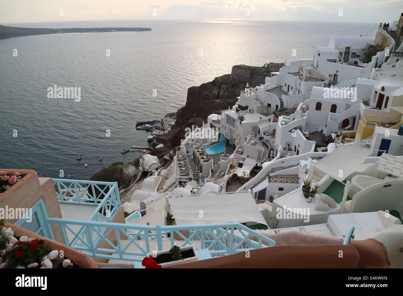 Houses, hotels, walkways, pools, white buildings, all clinging to the ...