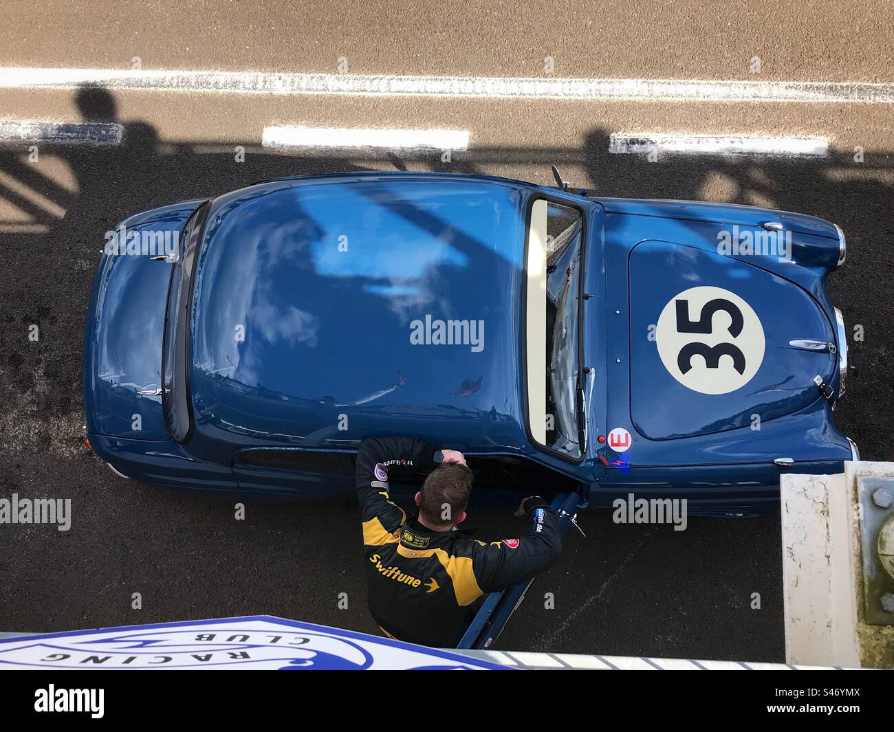 Blue 1950s Austin A35 in the pit Lane waiting to go on track at ...