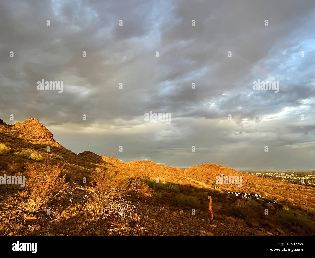Vibrant golden orange morning light, hints of rainbows over mountain ...