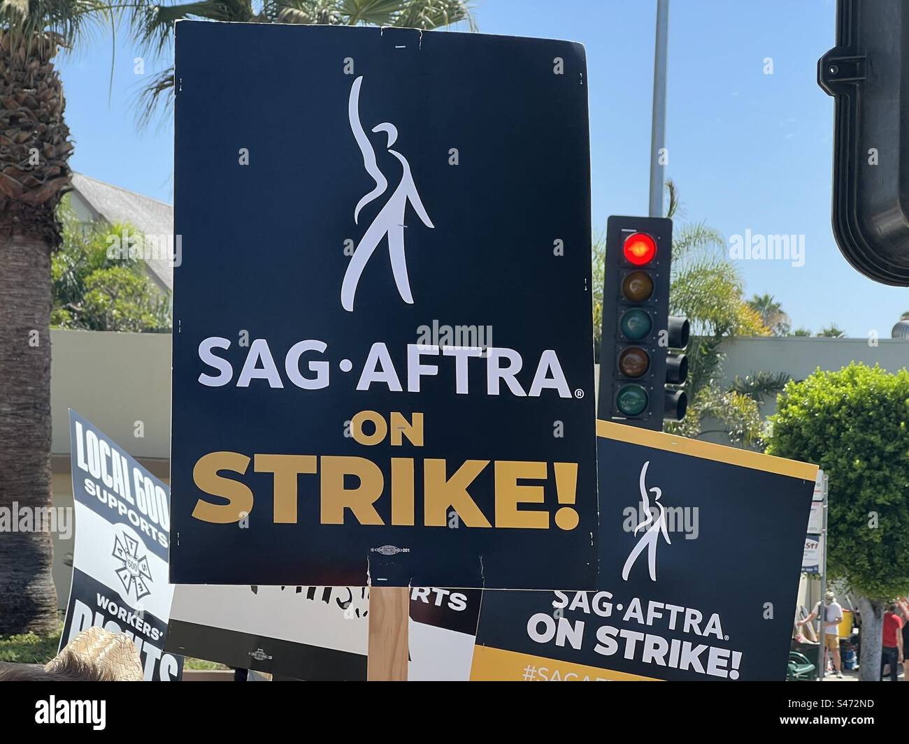 LOS ANGELES, CA, AUG 15, 2023: signs held by members of the Screen ...