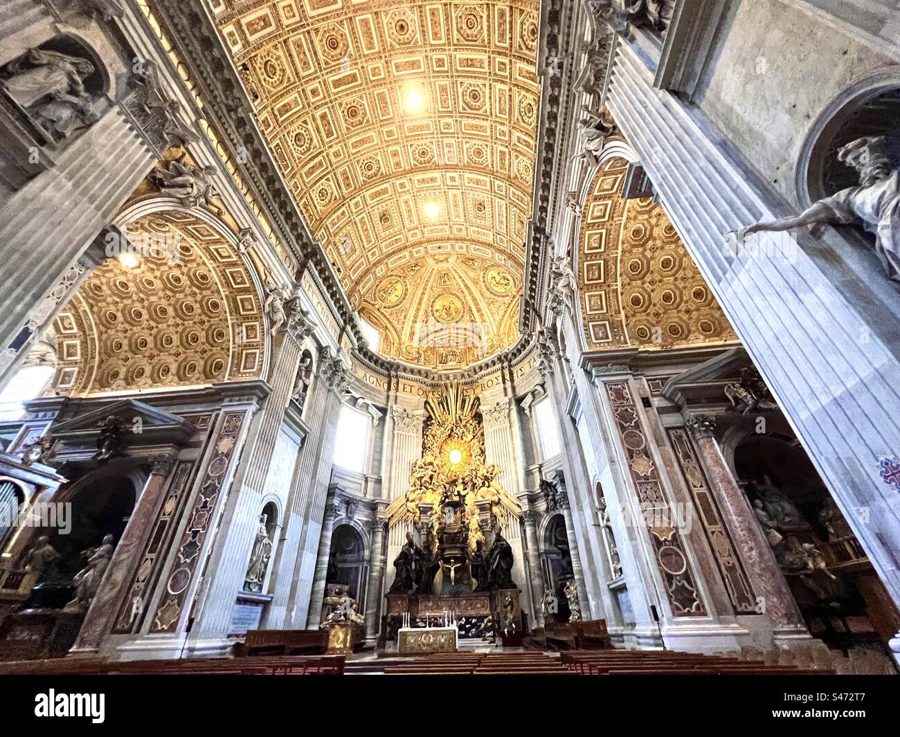 Beautiful alter area and curved ornate ceilings in St. Peter’s Basilica ...