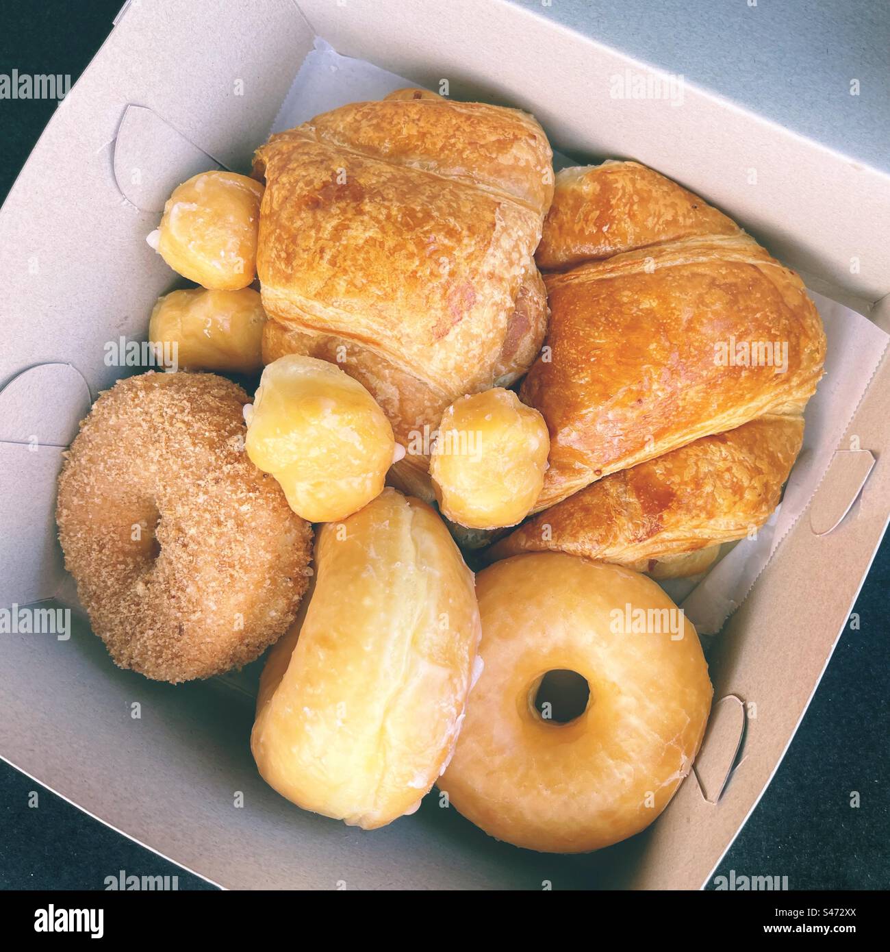 A box of donuts and croissants Stock Photo - Alamy