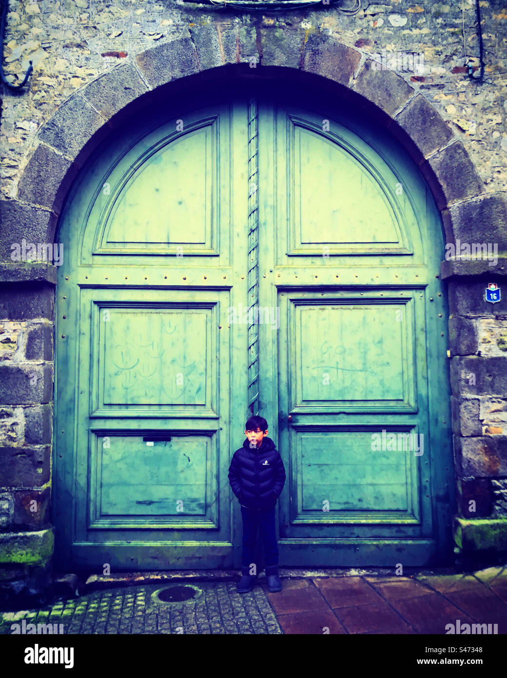 little guard at the big door Stock Photo - Alamy