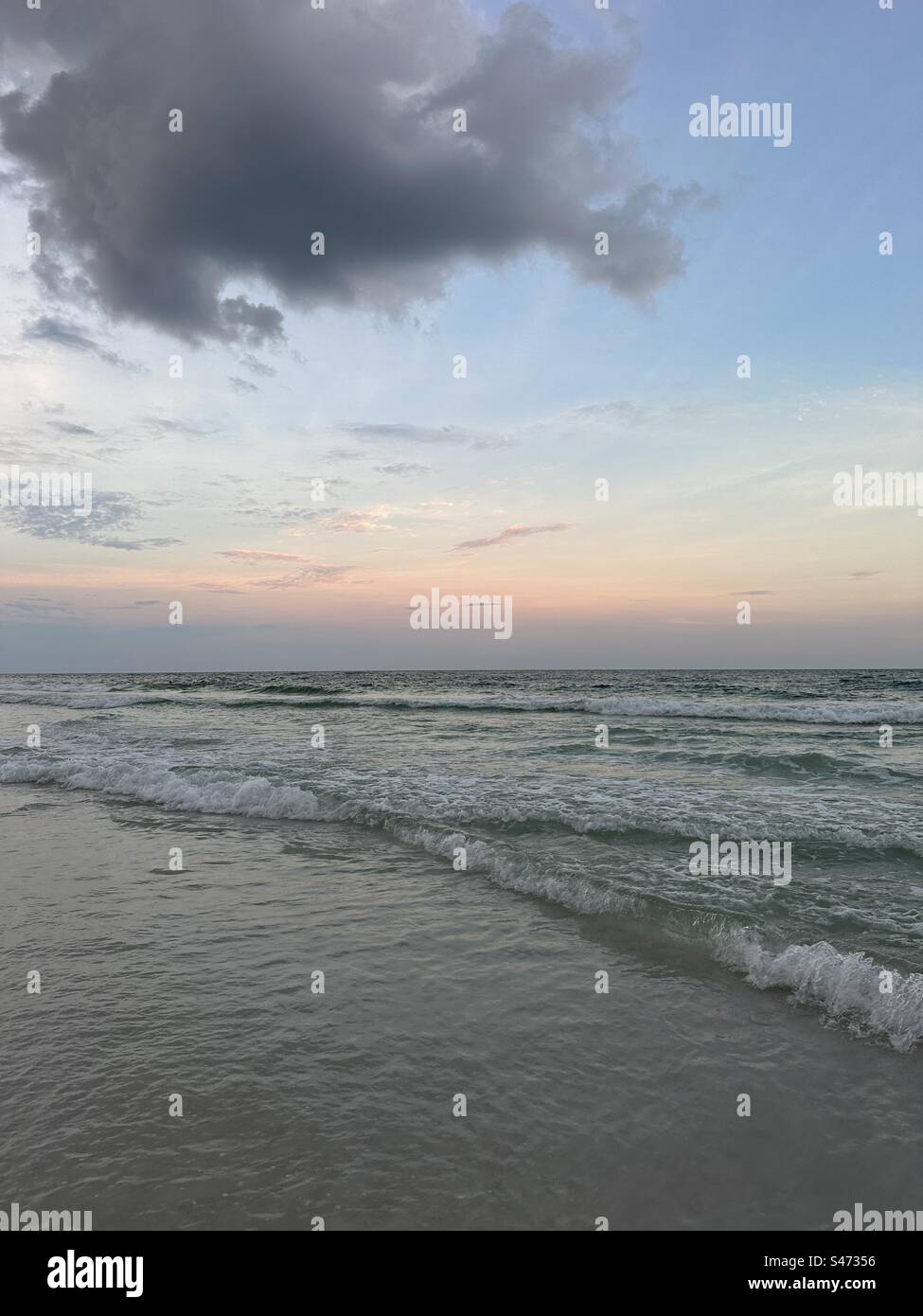 Soft sunset skies over the Gulf of Mexico Florida Emerald Coast with ...