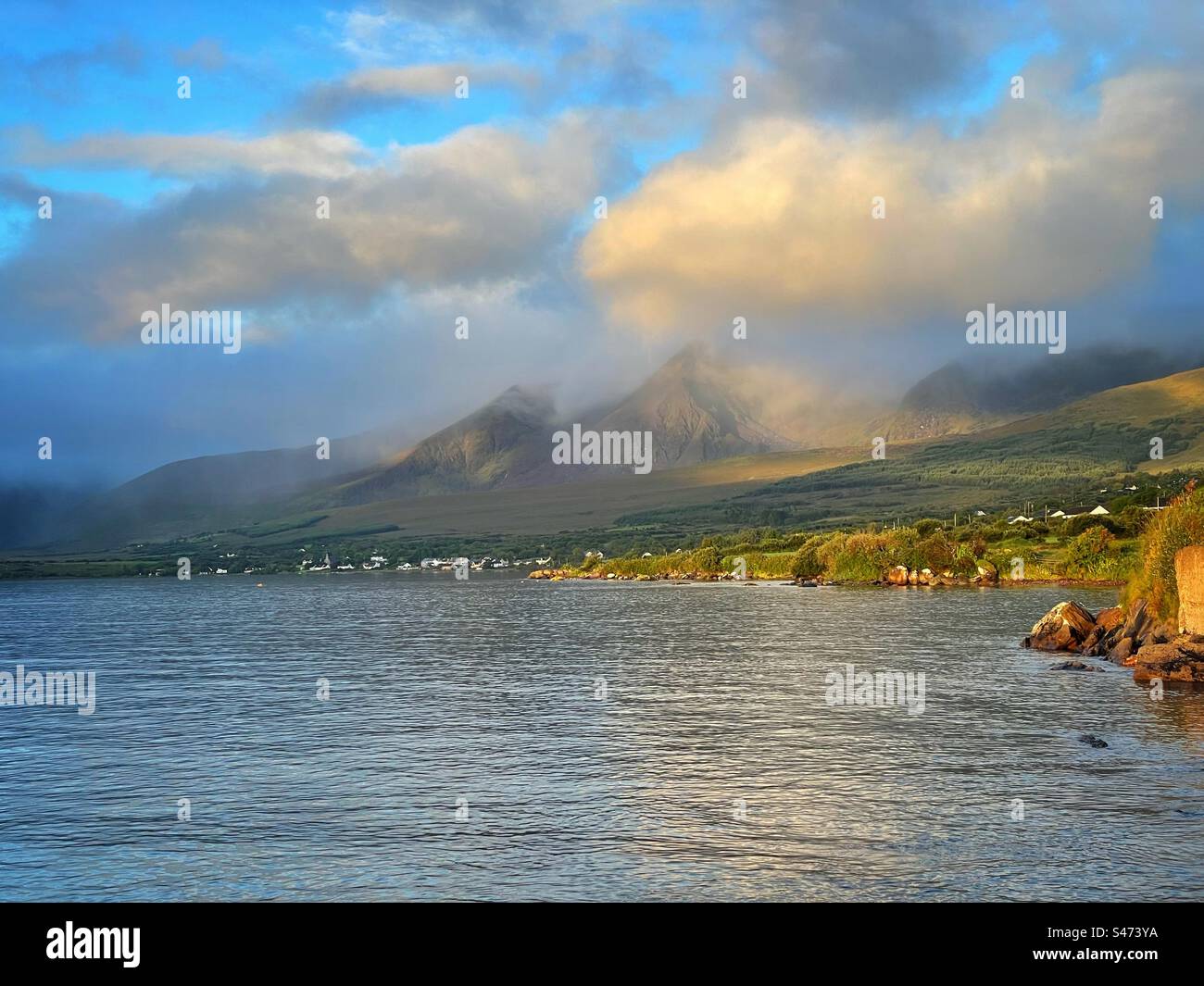 The village of Cloghane on the Owenmore estuary, Dingle peninsula ...