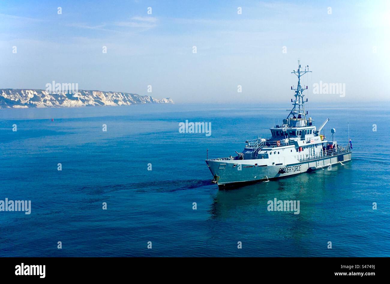 UK Border Force Boat with White Cliffs of Dover Stock Photo - Alamy