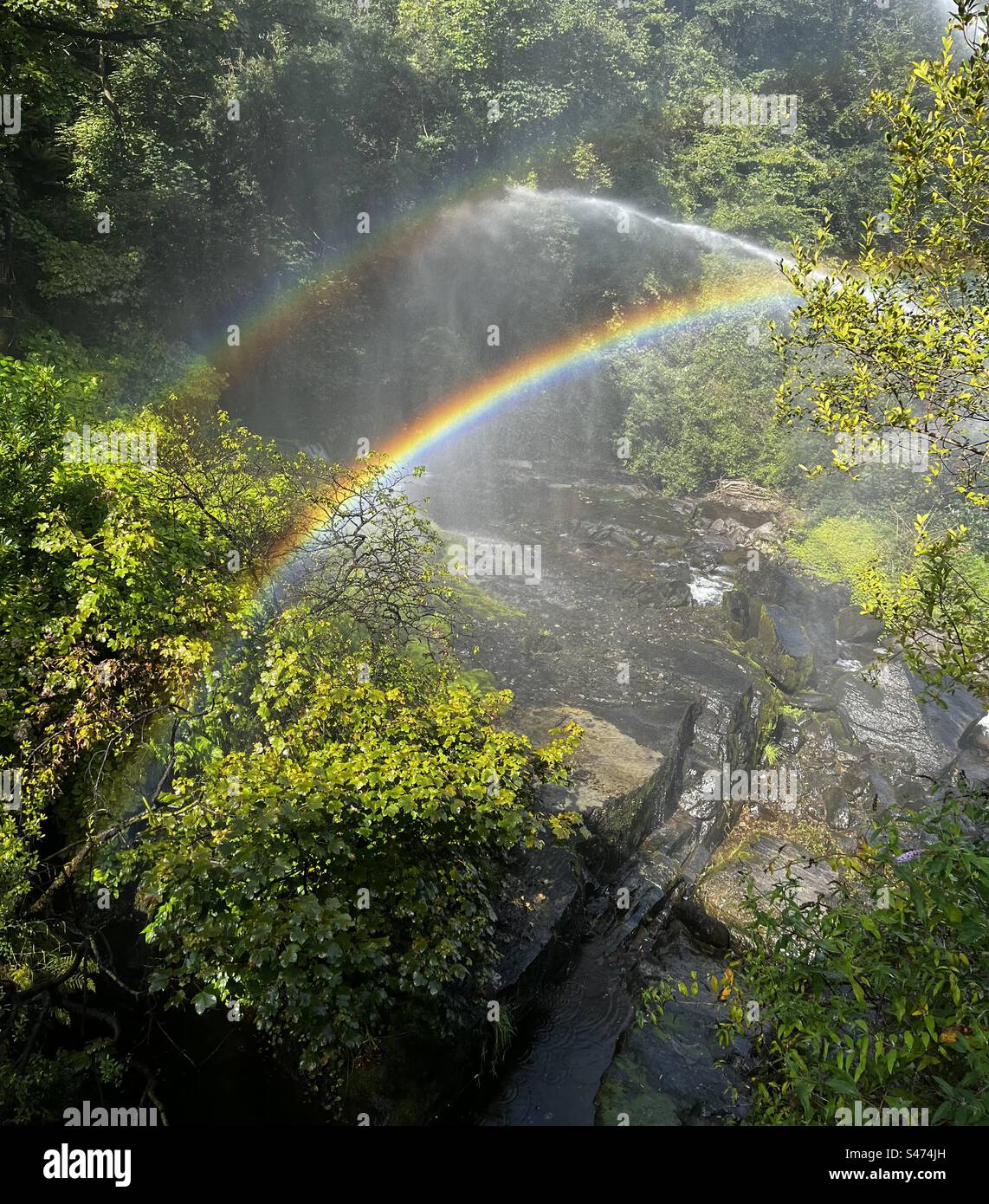 Water canon rainbow Stock Photo - Alamy