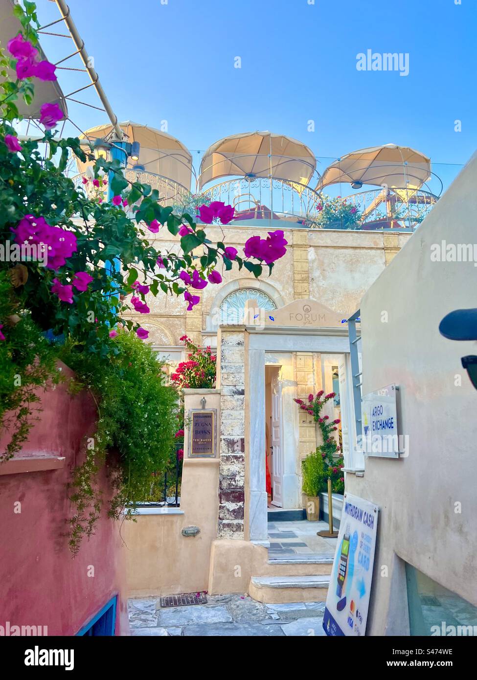Early evening on a small walking path in Oia, Santorini island Stock ...