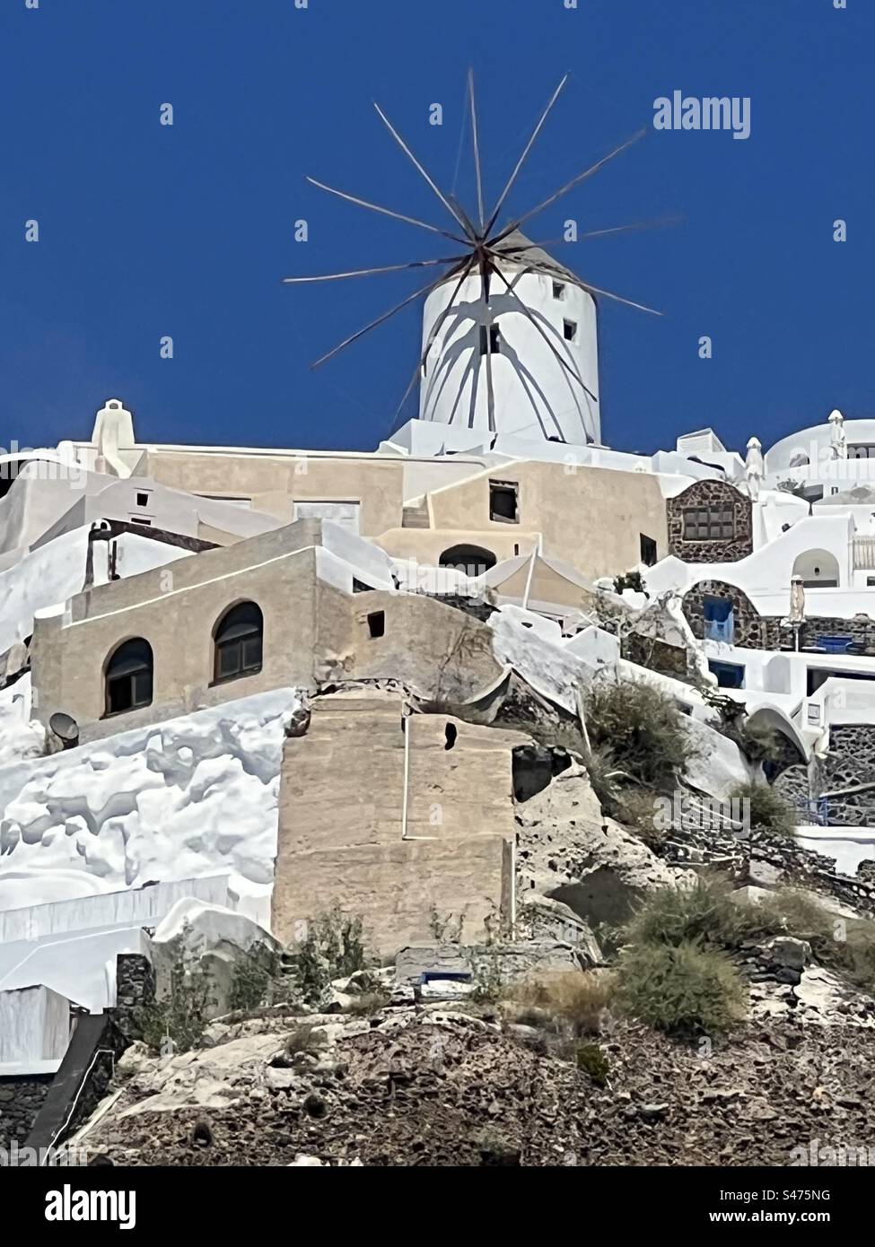 The windmill in Oia, Santorini, is an iconic landmark of the island ...