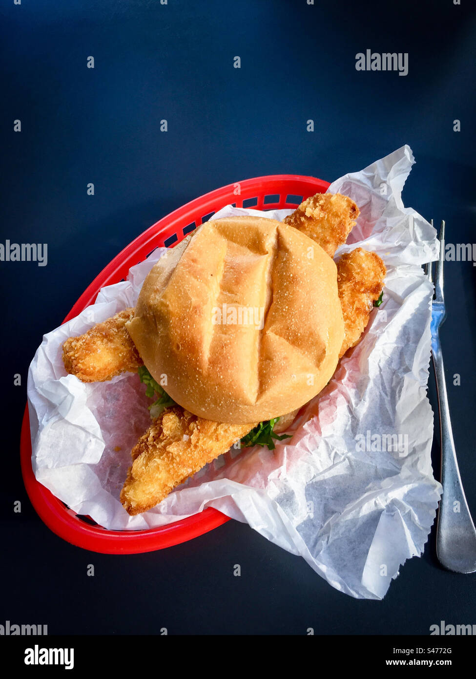 Freshly made battered fish sandwich Stock Photo - Alamy