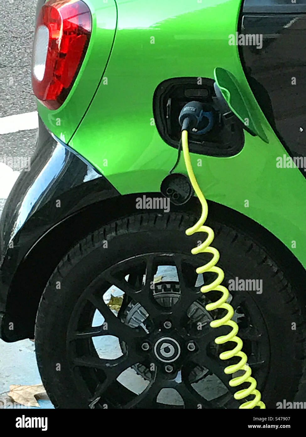 Recharging electric car Stock Photo - Alamy