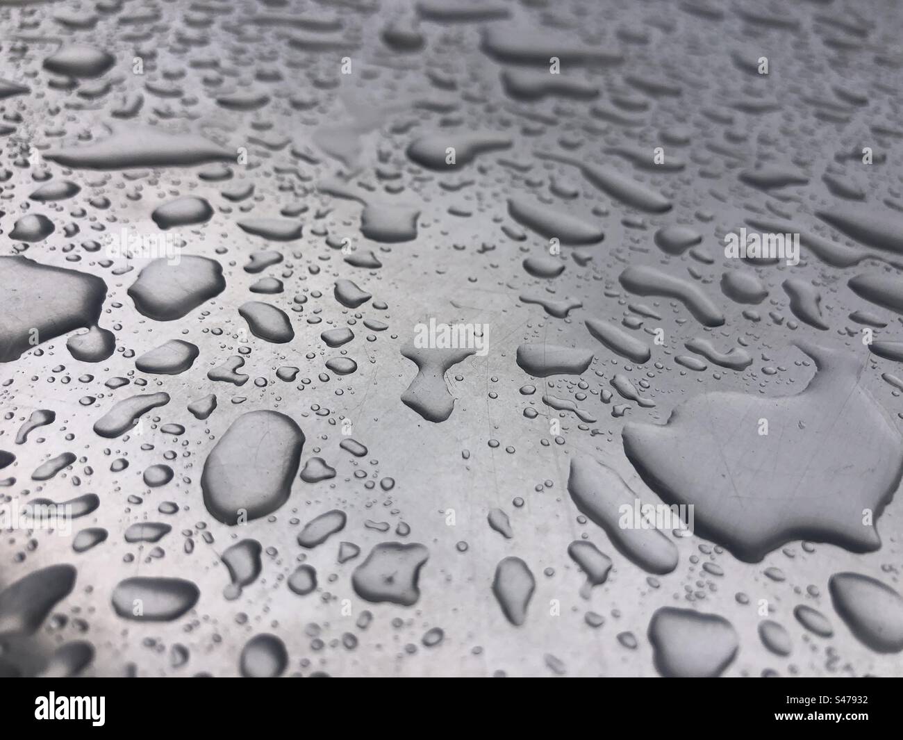 Water drops on metal surface Stock Photo - Alamy