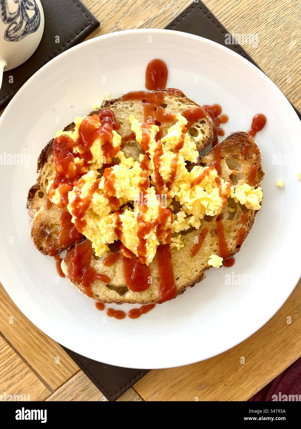 Scrambled eggs on sourdough bread hi-res stock photography and images ...