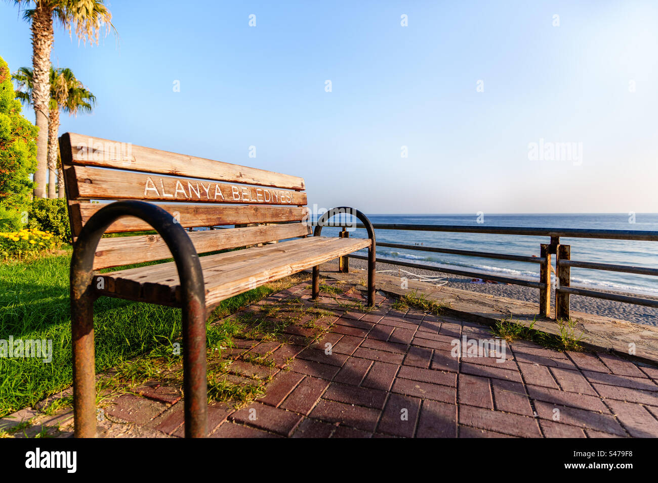 Wooden bench at the sea and beach Stock Photo - Alamy