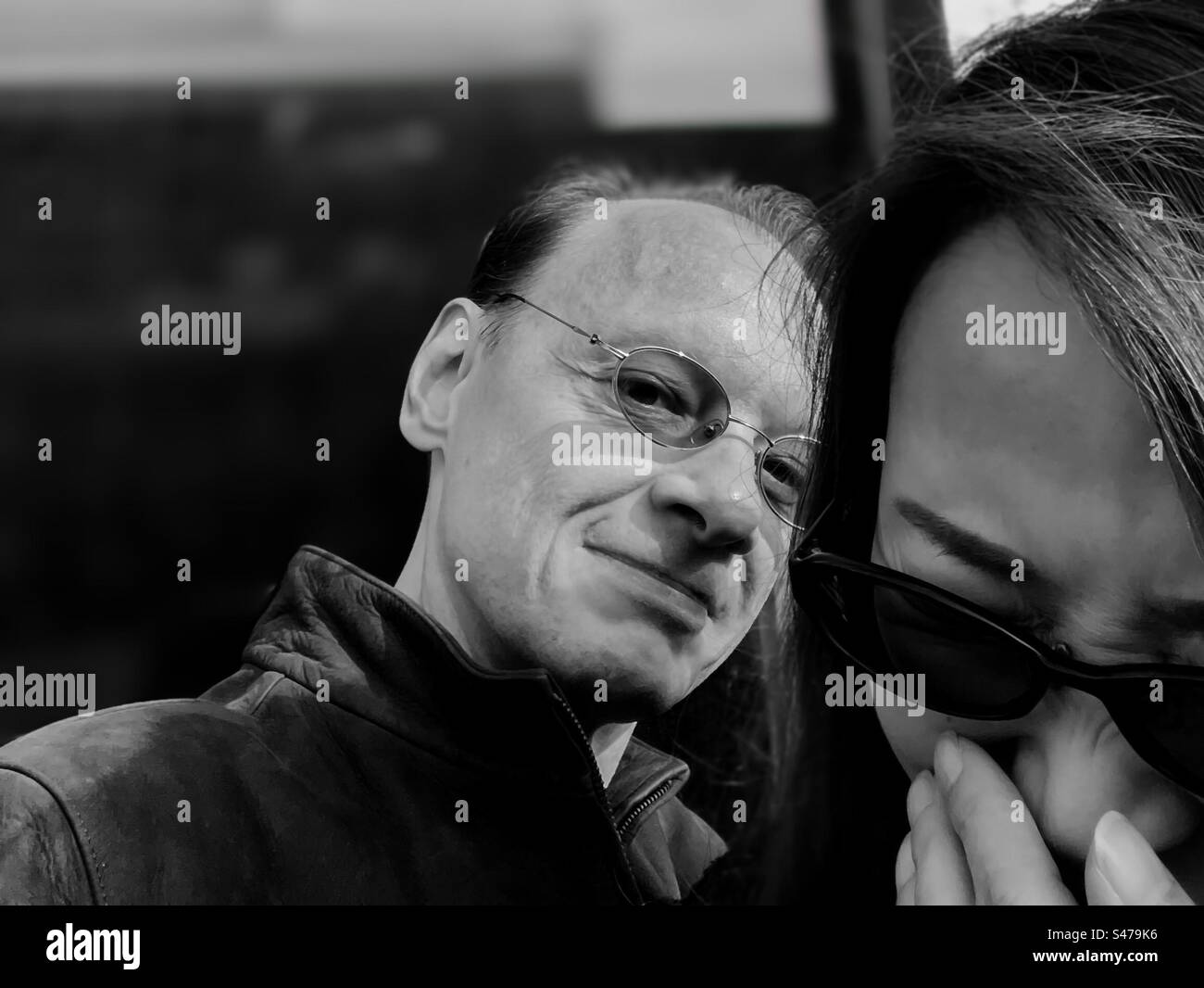 Black and white make smiling female laughing mouth covered Stock Photo ...