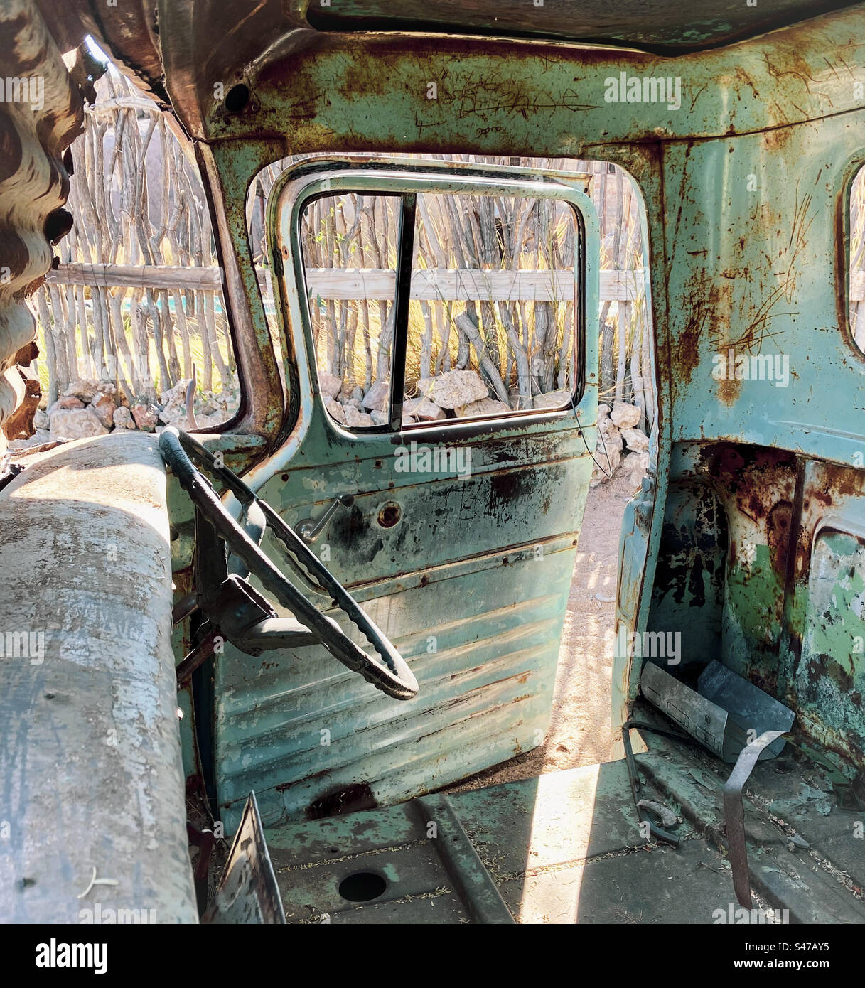The inside of an old abandoned pick up truck in a campsite in Namibia ...